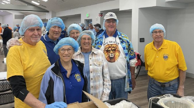 Lions take part in meal packing event - SANIBEL-CAPTIVA - Island ...